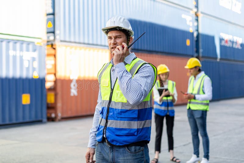 Foreman Using Radio Walkie Talkie Control Loading Containers Box in ...