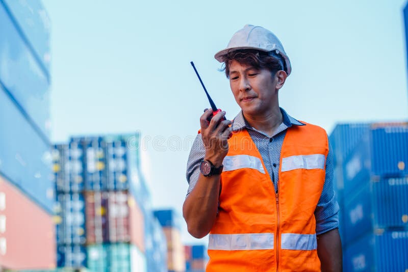 Foreman Using Radio Walkie Talkie Control Loading Containers Box in ...