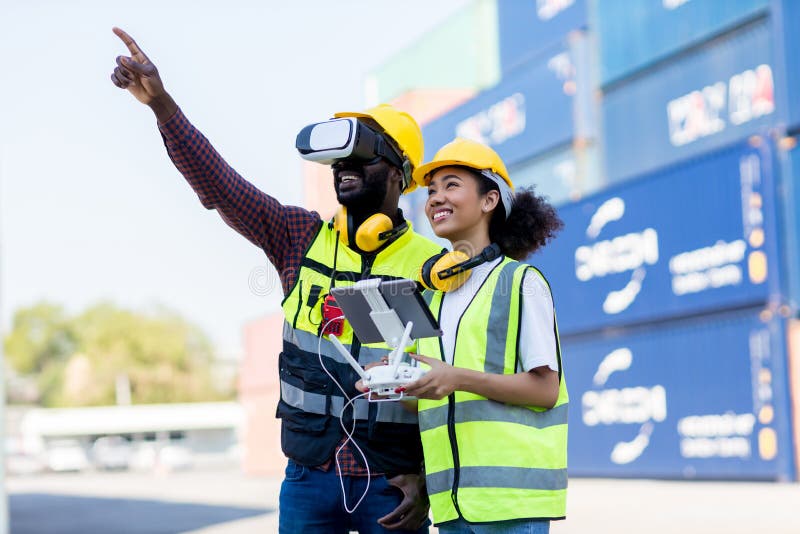 Foreman or Worker Use Remote Controller Piloting Drone at Containers ...