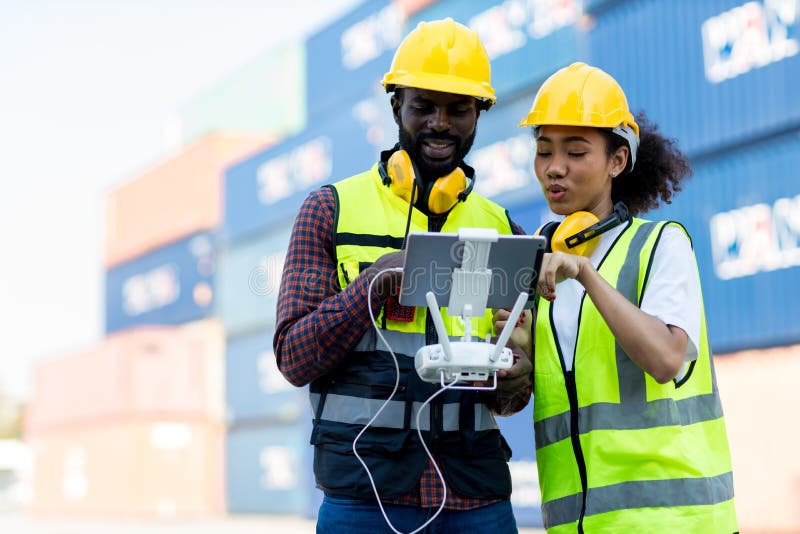 Foreman or Worker Use Remote Controller Piloting Drone at Containers ...