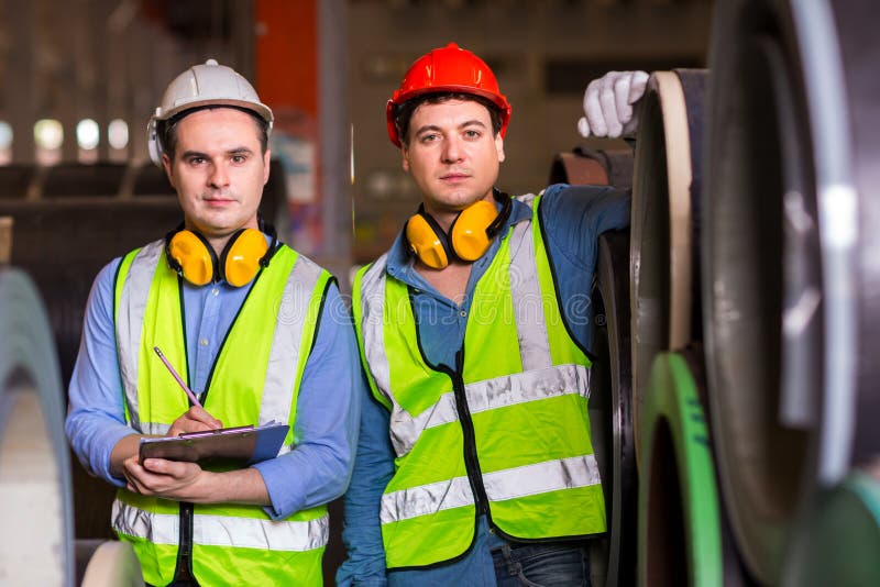 Foreman or Worker Work at Factory Site Check Up Machine or Products in ...