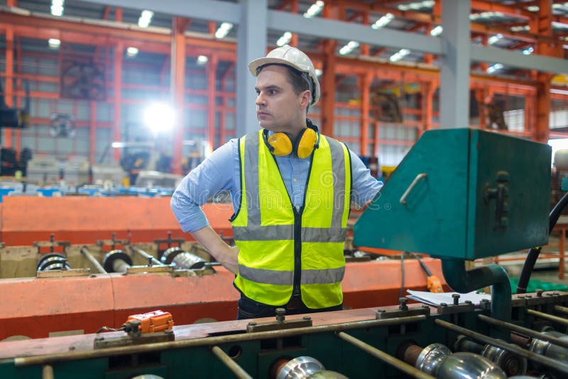 Foreman or Worker Work at Factory Site Check Up Machine or Products in ...