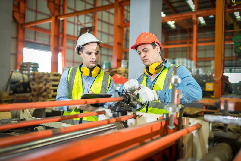 Foreman or Worker Work at Factory Site Check Up Machine or Products in ...