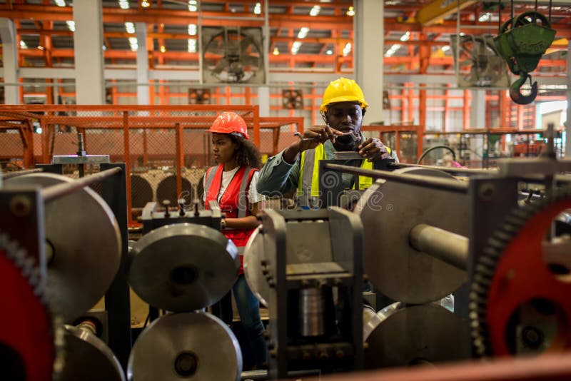 Foreman or Worker Work at Factory Site Check Up Machine or Products in ...