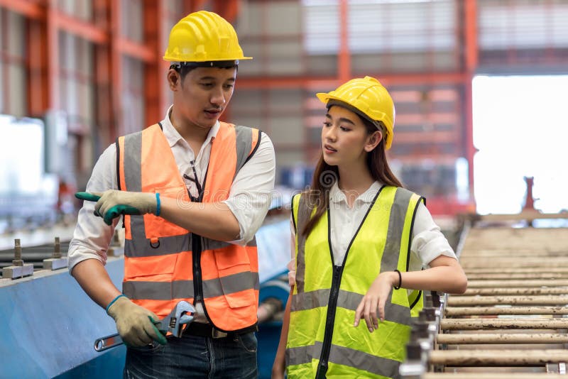 Foreman or Worker Work at Factory Site Check Up Machine or Products in ...