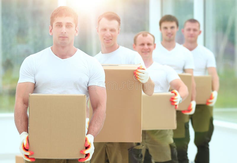 Team of Builders with Boxes of Building Materials Stock Image - Image ...