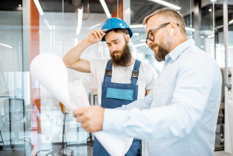 Foreman and Workman in the Office Stock Image - Image of blueprints ...