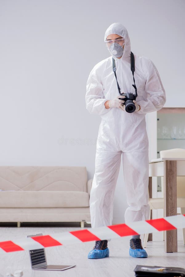 The Forensic Expert at Crime Scene Doing Investigation Stock Image ...
