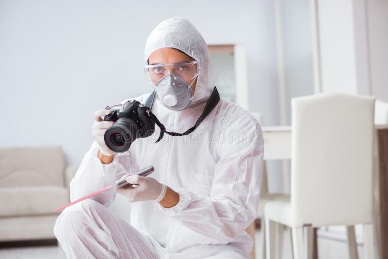 The Forensic Expert at Crime Scene Doing Investigation Stock Photo ...