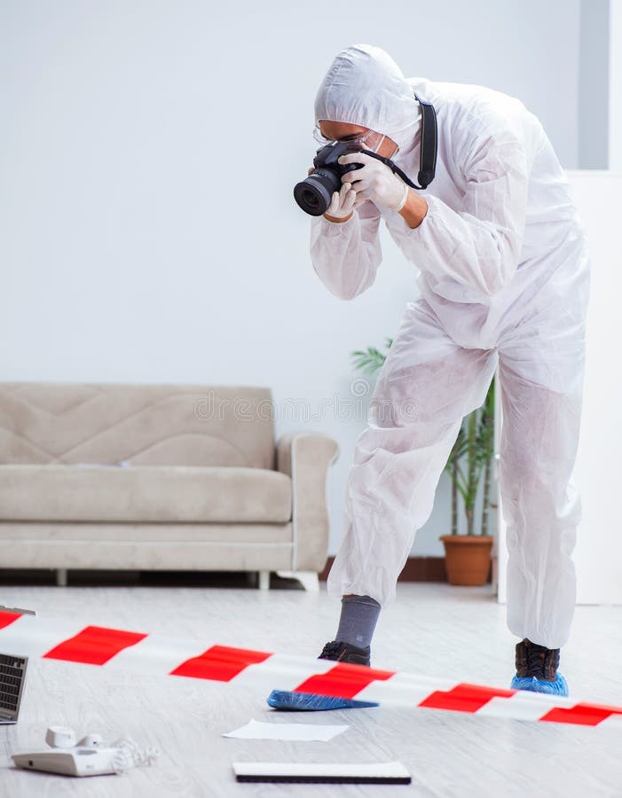 Forensic Expert at Crime Scene Doing Investigation Stock Photo - Image ...