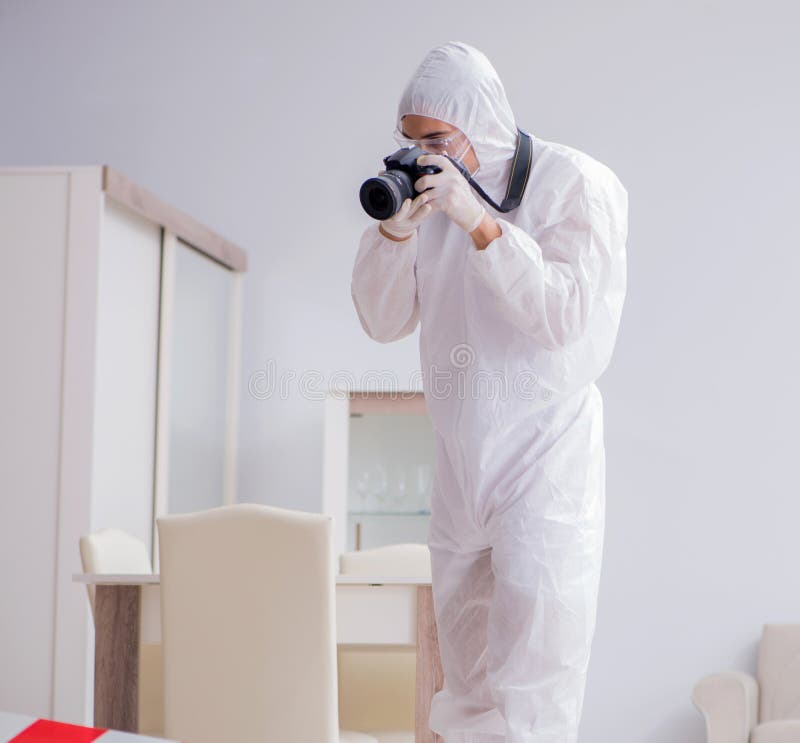 Forensic Expert at Crime Scene Doing Investigation Stock Photo - Image ...