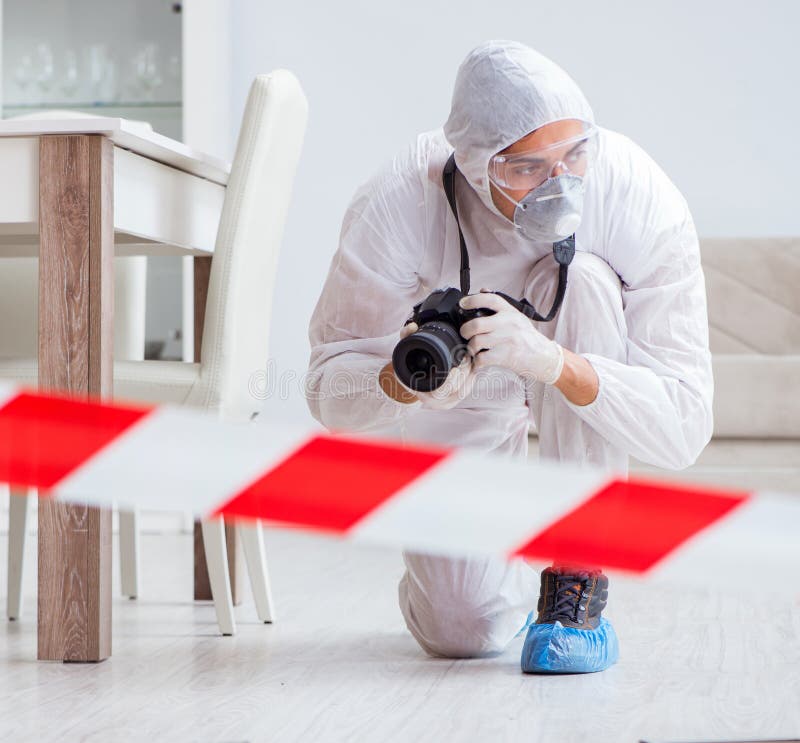 Forensic Expert at Crime Scene Doing Investigation Stock Photo - Image ...
