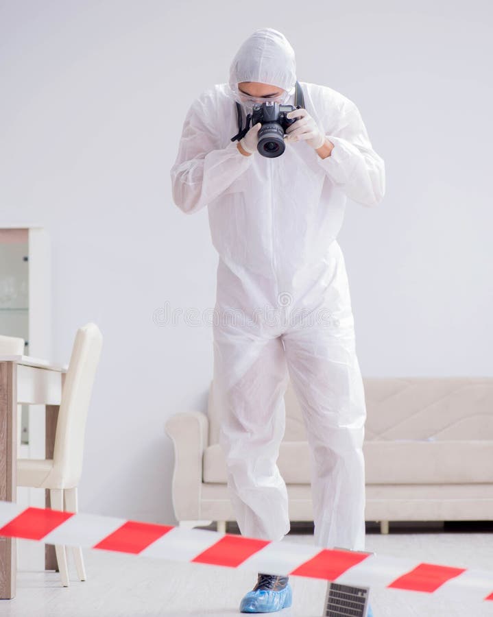 Forensic Expert at Crime Scene Doing Investigation Stock Photo - Image ...