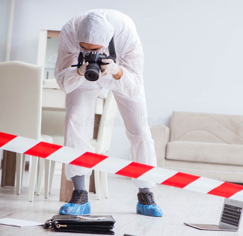 Forensic Expert at Crime Scene Doing Investigation Stock Photo - Image ...