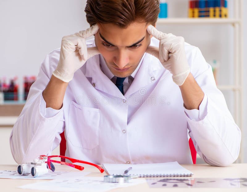 Forensic Expert Studying Fingerprints in the Lab Stock Photo - Image of ...