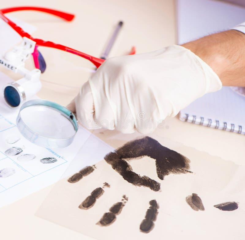 Forensic Expert Studying Fingerprints in the Lab Stock Image - Image of ...