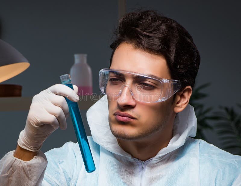 Forensic Investigator Working in Lab Looking for Evidence Stock Image ...