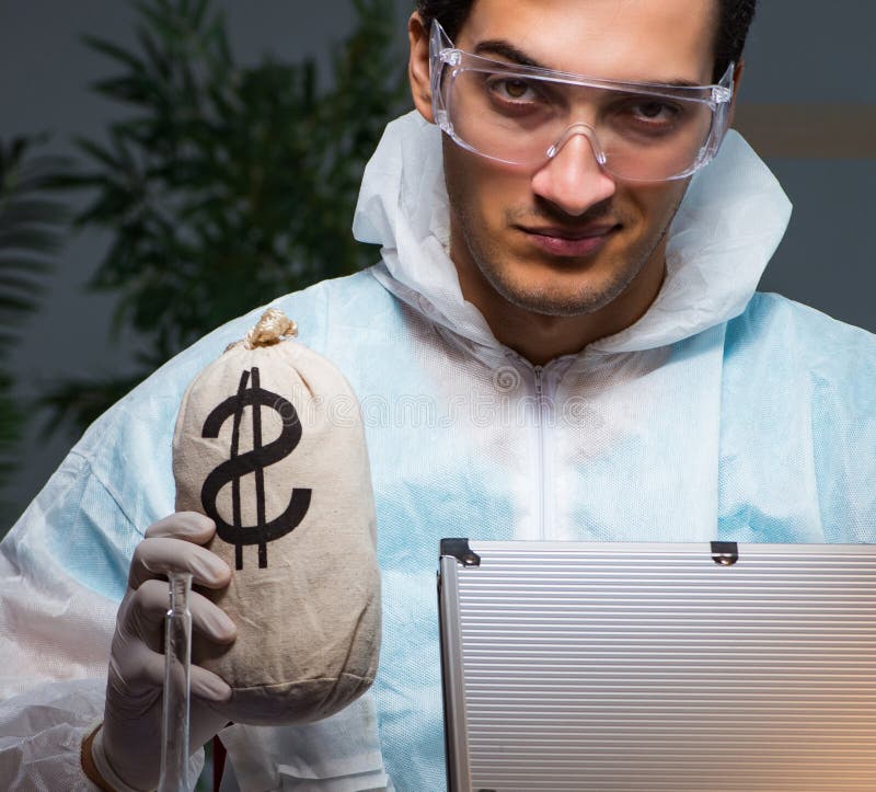 Forensic Investigator Working in Lab Looking for Evidence Stock Photo ...