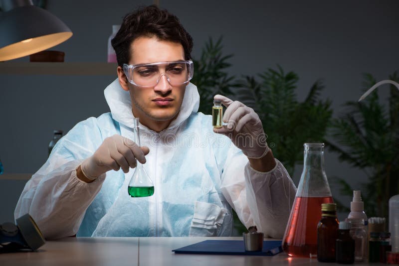 The Forensic Investigator Working in Lab Looking for Evidence Stock ...