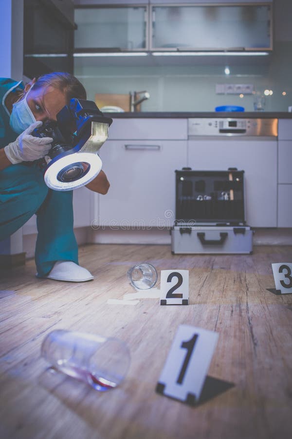 Forensic Specialist Taking Photos on a Crime Scene Stock Image - Image ...