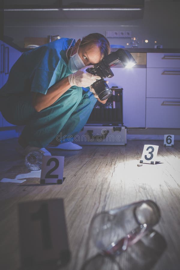 Forensic Specialist Taking Photos on a Crime Scene Stock Image - Image ...