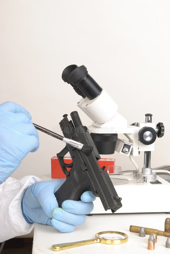 Forensic study of gun stock image. Image of bullet, microscope - 51510513