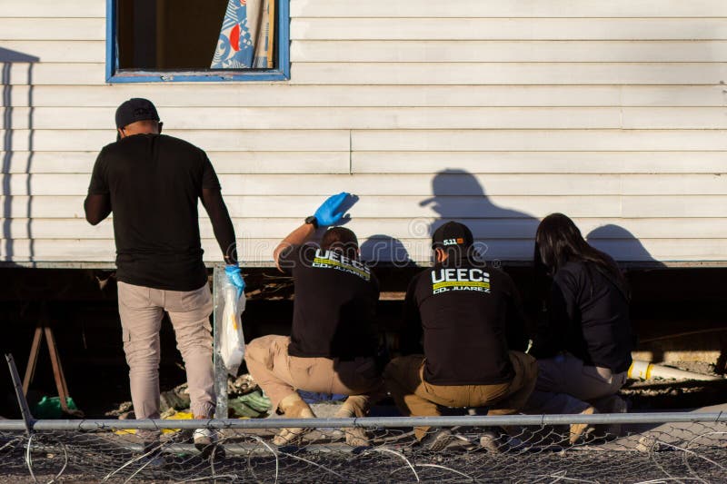 Forensic Team Investigating Under House Editorial Stock Photo - Image ...