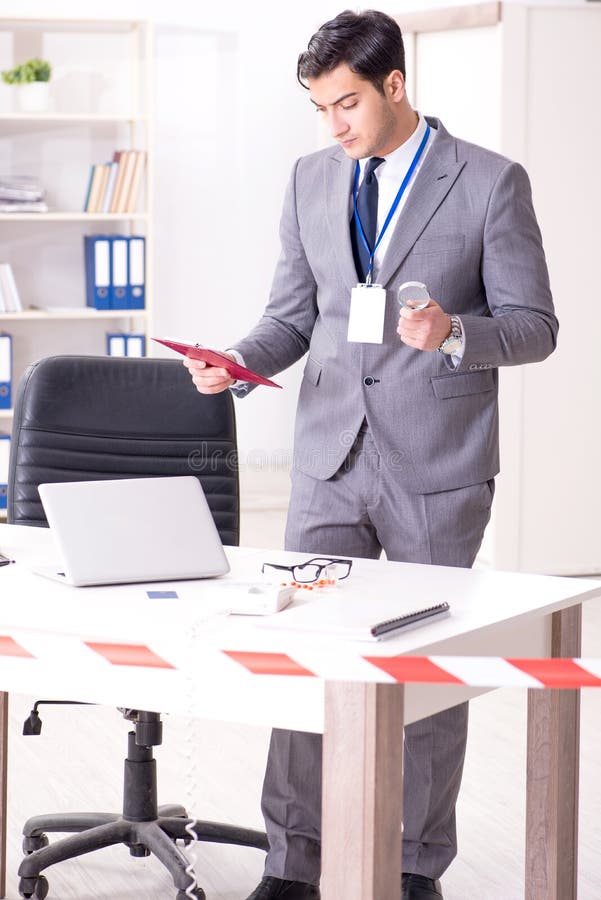 The Forensics Investigator at the Scene of Office Crime Stock Photo ...