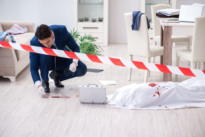 The Forensics Investigator at the Scene of Office Crime Stock Image ...
