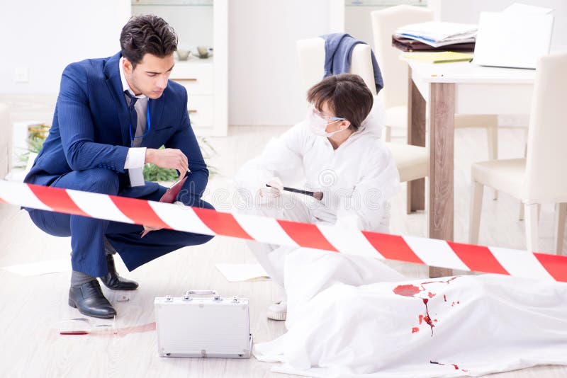 The Forensics Investigator at the Scene of Office Crime Stock Image ...