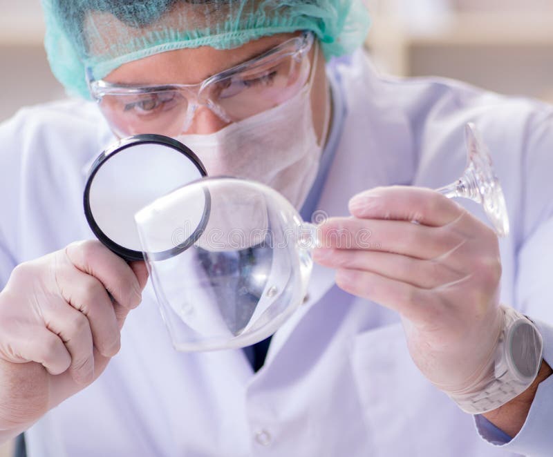 Forensics Investigator Working in Lab on Crime Evidence Stock Photo ...