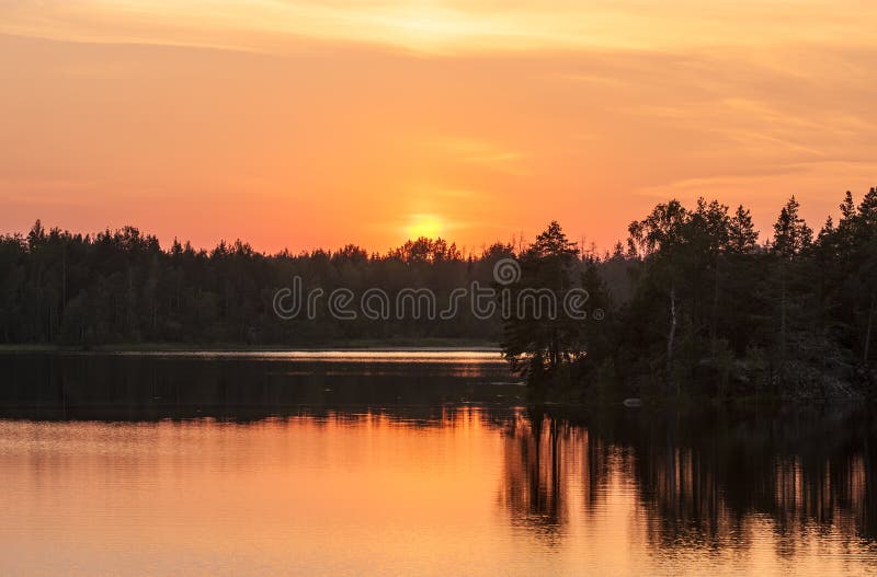 Forest lake after sunset stock image. Image of yellow - 109716307