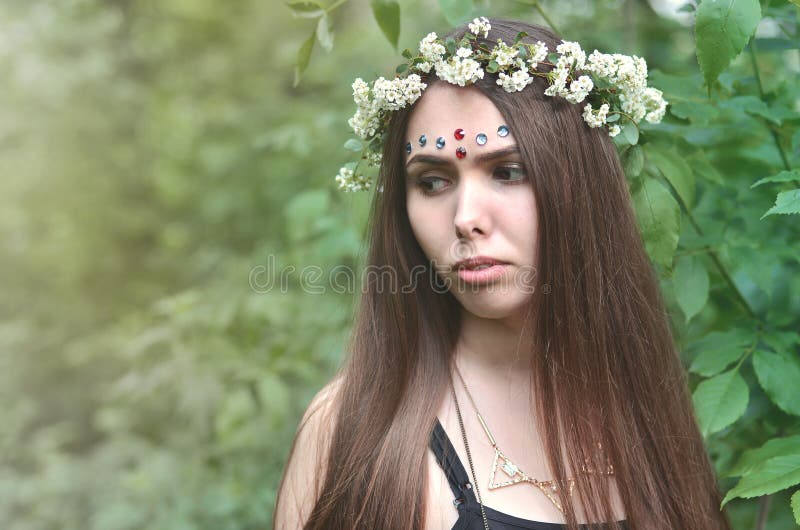 A Forest Picture Of A Beautiful Young Brunette Of European Appearance