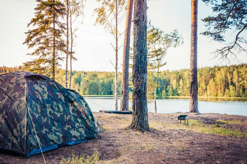 Forest Scenery With Camping Tent On Bank Of Lake Stock Photo - Image of ...