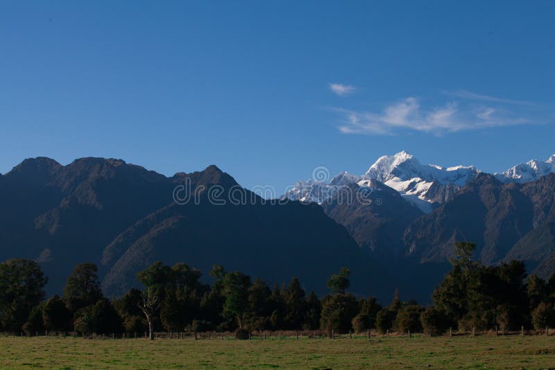 Forest Snow Mountain View Green Field Stock Photo - Image of festive ...