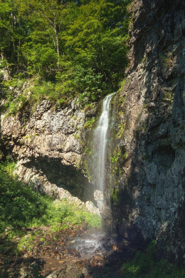 Waterfall with Big Rock in the Rain Tropical Forest Stock Image - Image ...