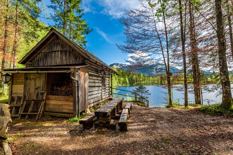 Forest Wooden Hut in the Alps at the Lake Stock Image - Image of water ...
