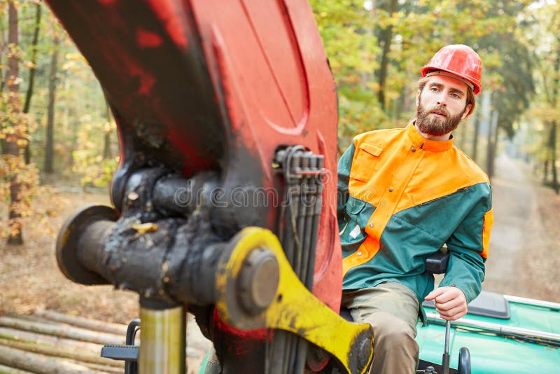 Forest Workers on Forestry Crane of Forwarder in the Forest Stock Image ...