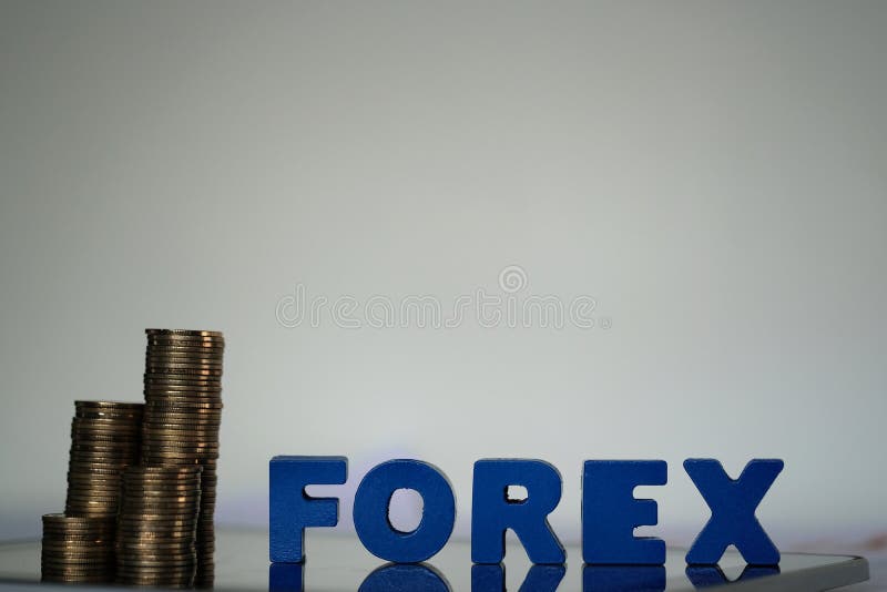 FOREX Text and Stack of Coin with Tablet Computer and Financial ...
