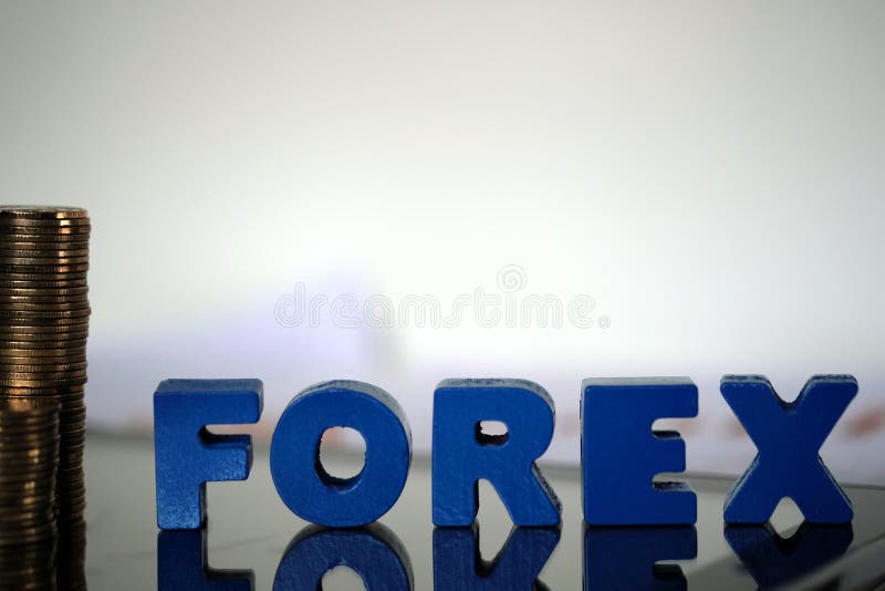 FOREX Text and Stack of Coin with Tablet Computer and Financial ...