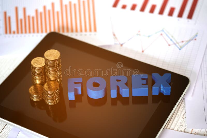 FOREX Text and Stack of Coin with Tablet Computer and Financial ...