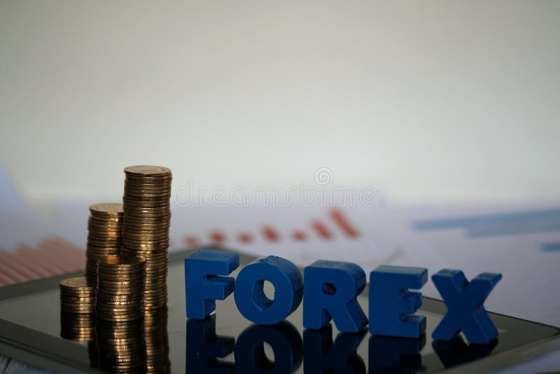FOREX Text and Stack of Coin with Tablet Computer and Financial ...