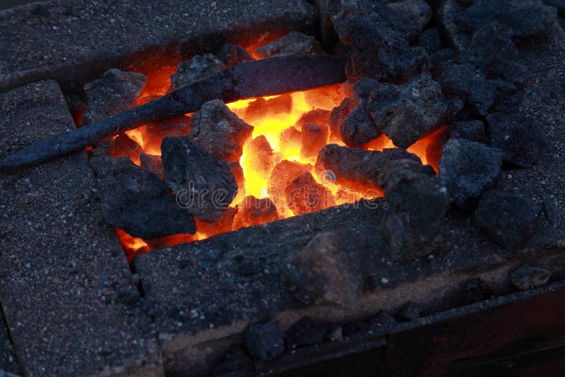 Forge, fiery coals stock photo. Image of heat, steel - 138812976