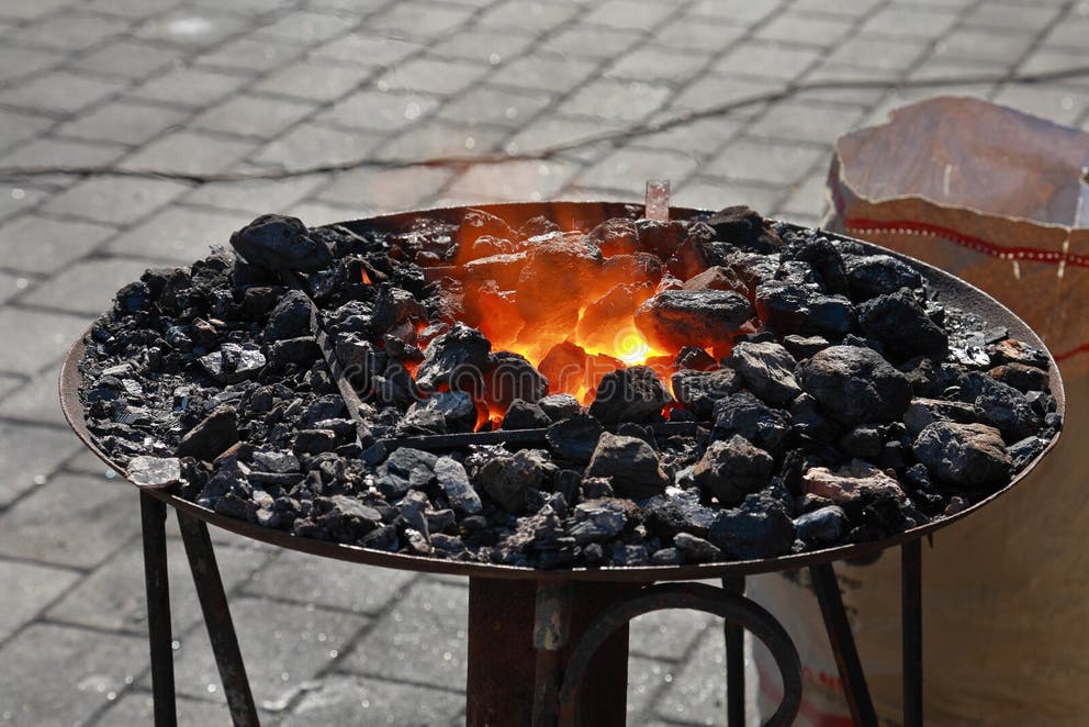 Forge, fiery coals stock photo. Image of steel, embers - 138812962