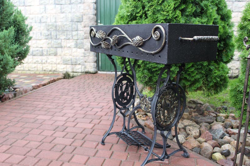 The Forged Brazier a Handmade Brazier with Shod Elements in a Yard ...