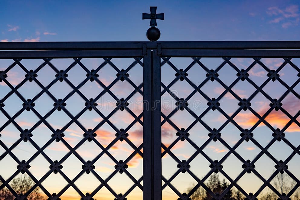 Forged Gate with a Cross at Sunset Stock Image - Image of gate ...
