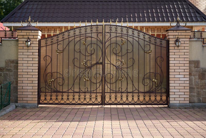 Forged Metal Gates with Ornate Lines Stock Image - Image of gate, metal ...