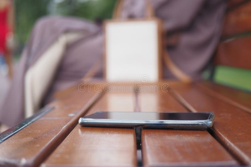 Forget Smartphone on a Park Bench, Lost Smart Phone Stock Image - Image ...