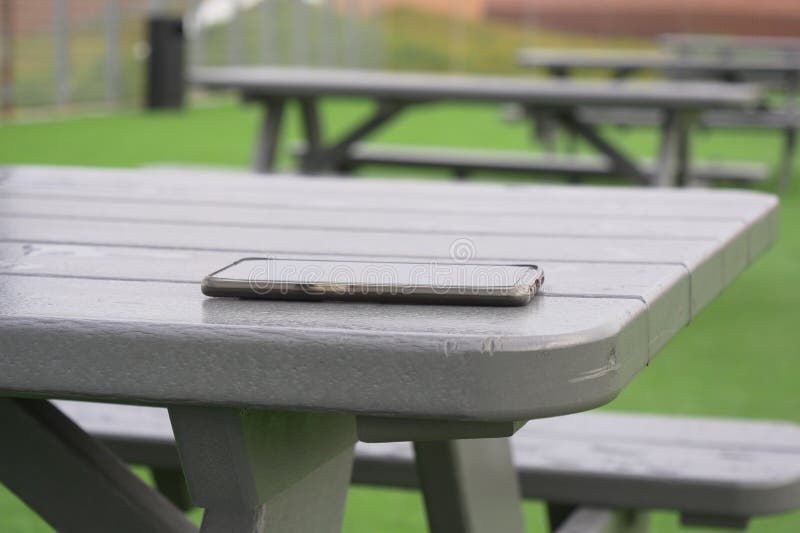 Forget Smartphone on a Park Bench, Lost Smart Phone Stock Image - Image ...