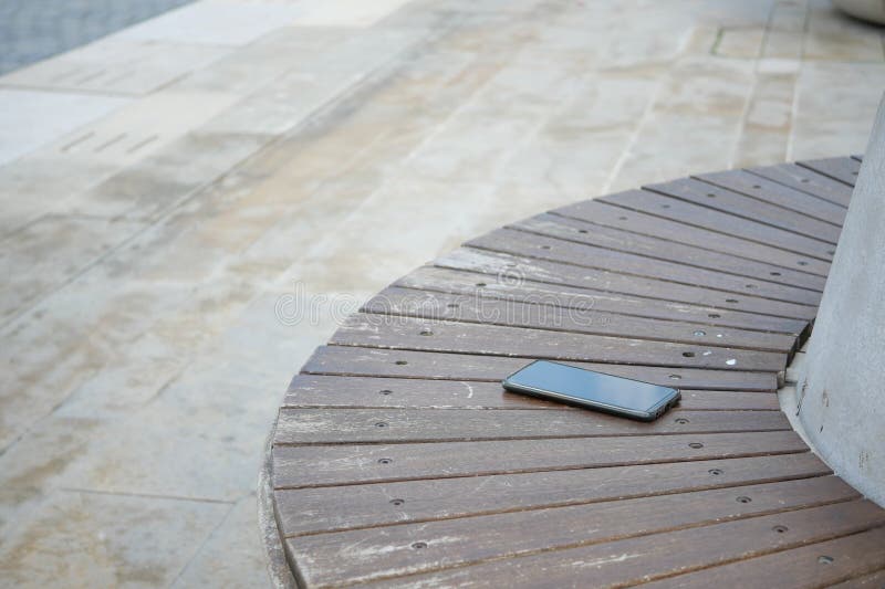 Forget Smartphone on a Park Bench, Lost Smart Phone Stock Image - Image ...